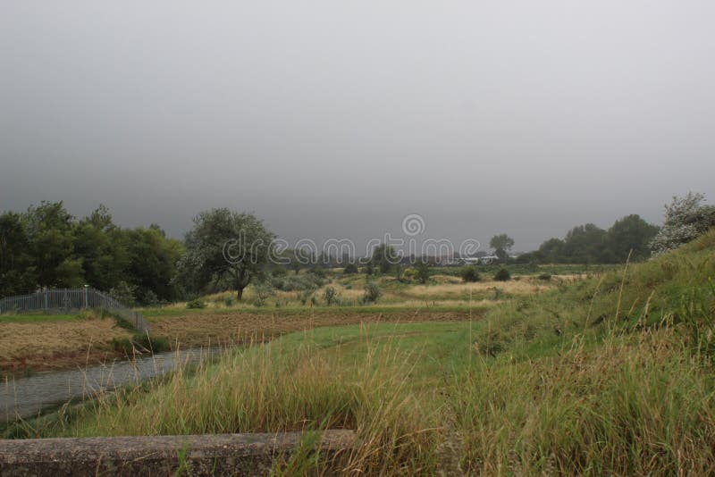 Storm Rolling in Over Countryside Stock Image - Image of clouds, water ...