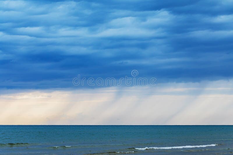 Storm on the Sea with Rain Clouds Stock Photo - Image of rain, storm ...