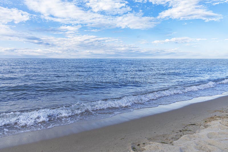 Waves on the Sea Dispersed by the Wind on a Cloudy Day. Stock Photo ...