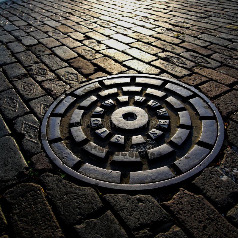 A storm sewer cover stock photo. Image of iron, protect - 16596866