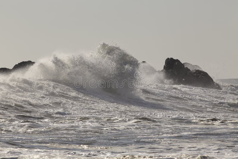 Storm waves covering rocks stock image. Image of horizon - 173738443