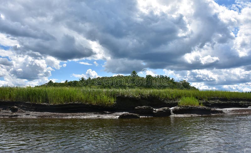 Storms on the Horizon Over a Marsh Stock Photo - Image of tributary ...