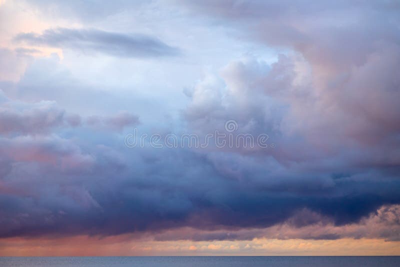 Stormy clouds at sunset stock photo. Image of holiday - 264661040