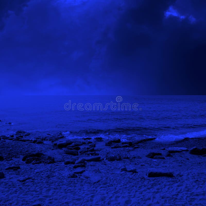 Stormy day on beach stock photo. Image of clouds, mediterranean - 131859952