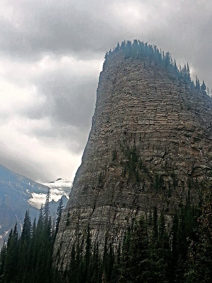 Stormy mountain cliff stock photo. Image of mountain - 52450872