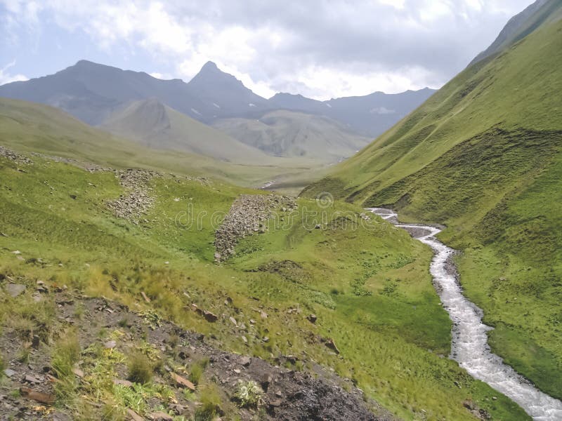 A Mountain River Flows between the Ridges of the Caucasian Mountain ...