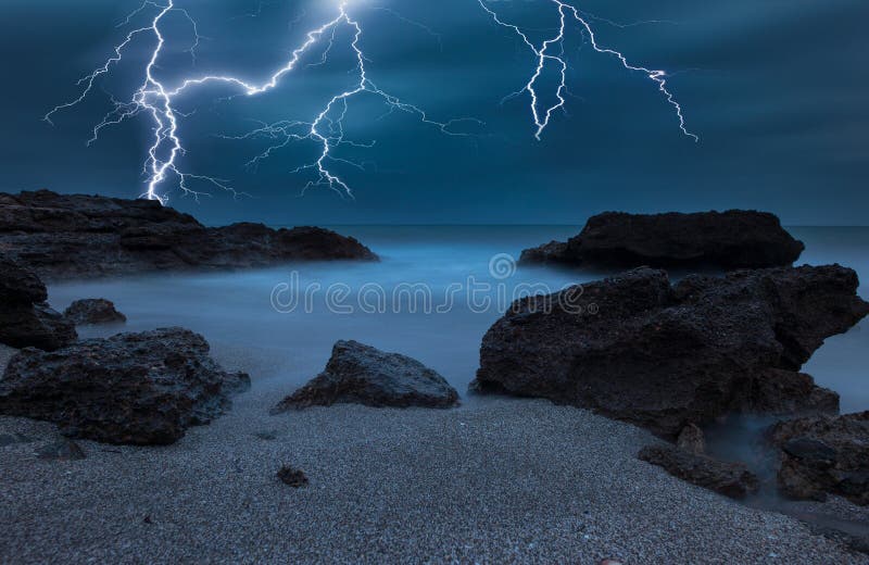 A Stormy Night in the Blue Sea Stock Image - Image of lightning, night ...
