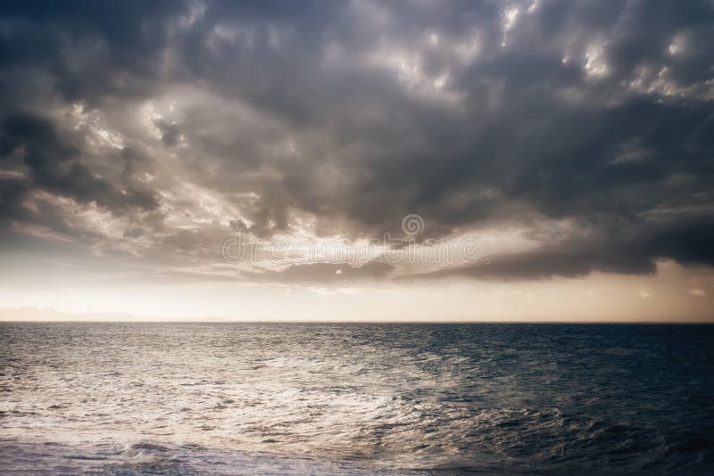 Stormy Ocean with Sunset Cloudy Sky Stock Image - Image of coast ...