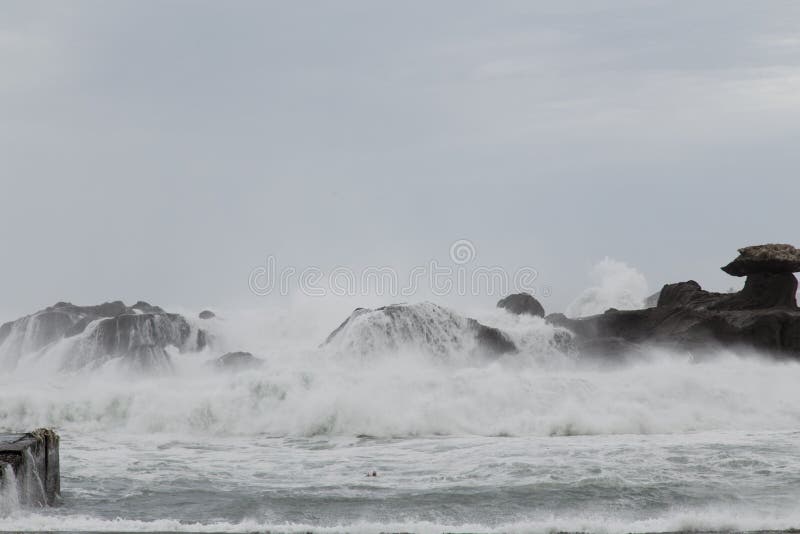 Stormy Sea with Waves Crashing on Rocks Stock Photo - Image of tsunami ...
