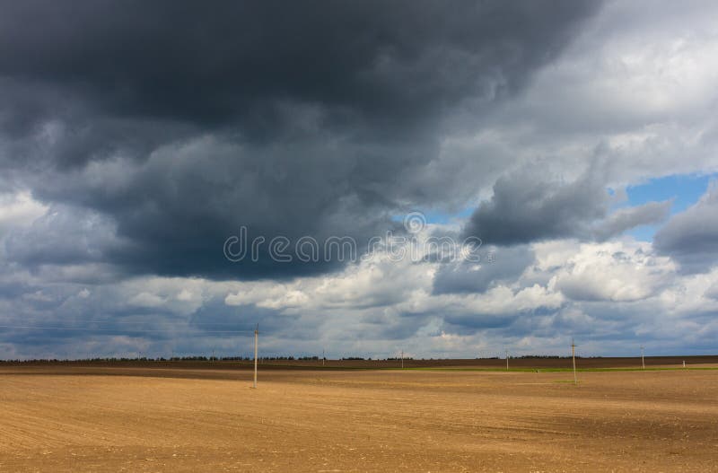 Stormy sky and field stock image. Image of season, rain - 119892289