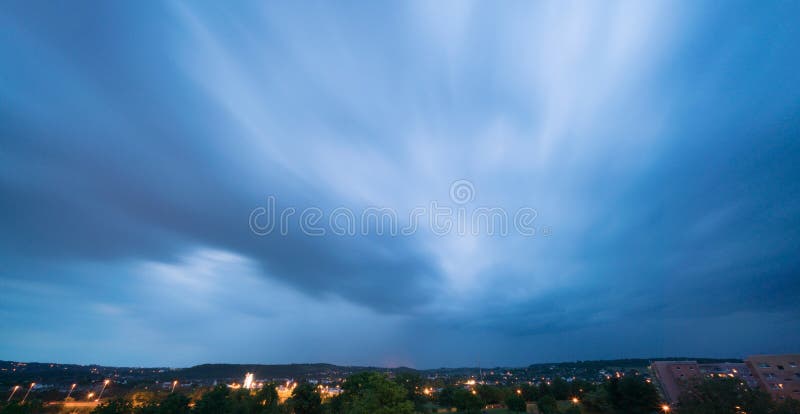 Stormy Sky Over a City at Night Stock Photo - Image of light, dramatic ...