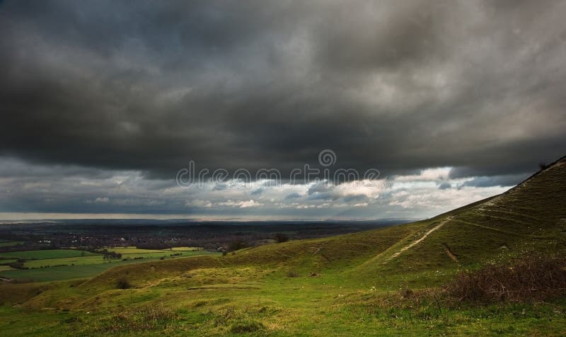 Stormy Sky Over Countryside Landscape Stock Photo - Image of fields ...