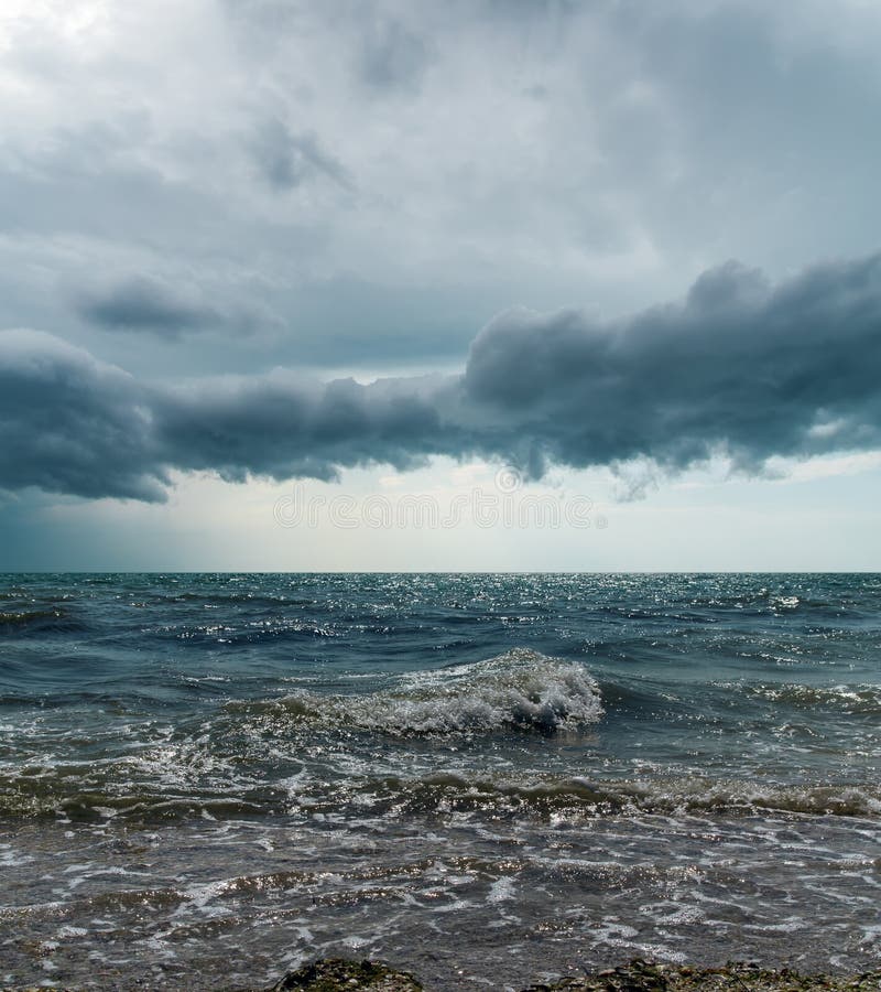 Stormy sky over dark sea stock image. Image of cloudy - 65513785