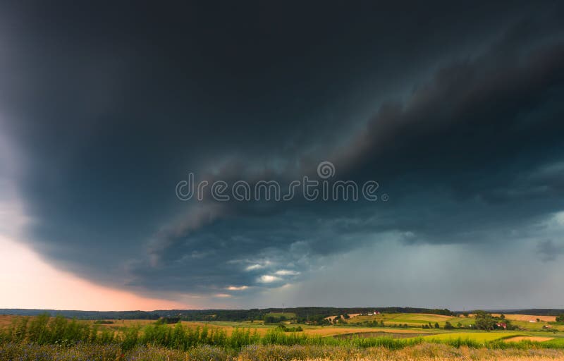 Stormy sky over field stock photo. Image of cloudscape - 57588362