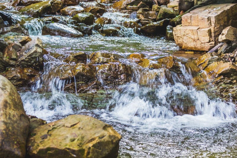 Stormy Stream of Water in a Mountain River with a Small Waterfall ...
