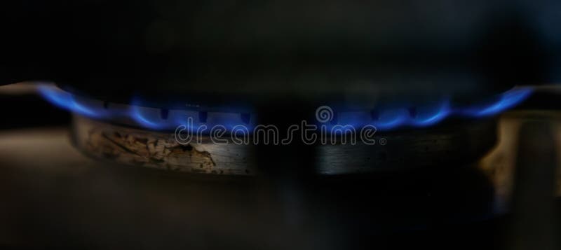 A stove burner is lit blue stock photo. Image of cook - 359530764