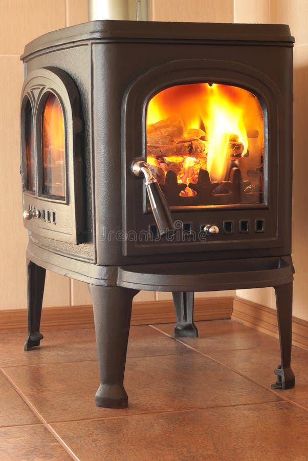 Wood fired stove stock photo. Image of irons, fireplace - 36026360