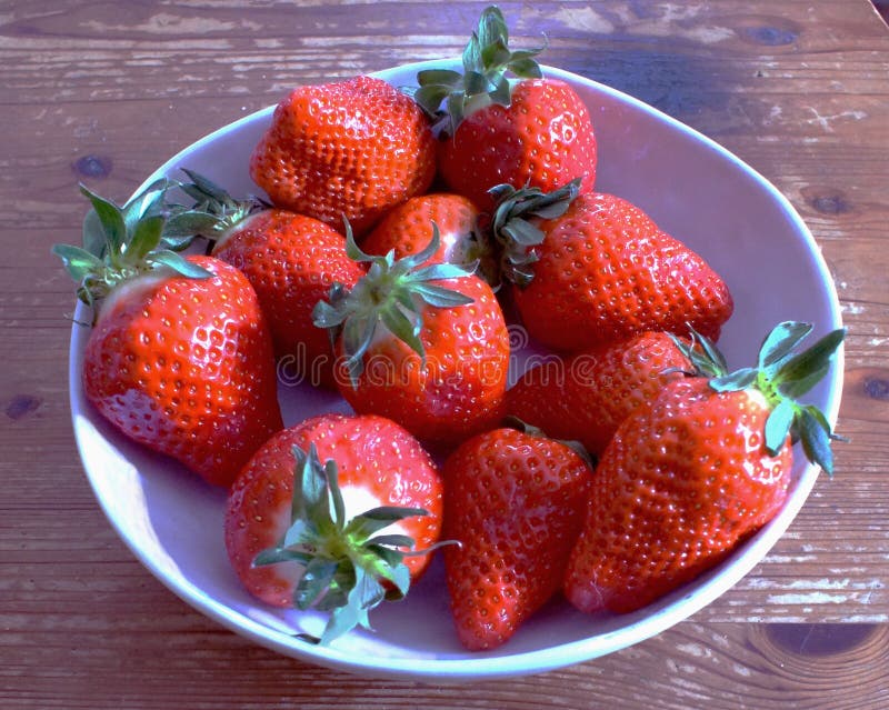 Strawberries on plate stock image. Image of shiny, natural - 148207059