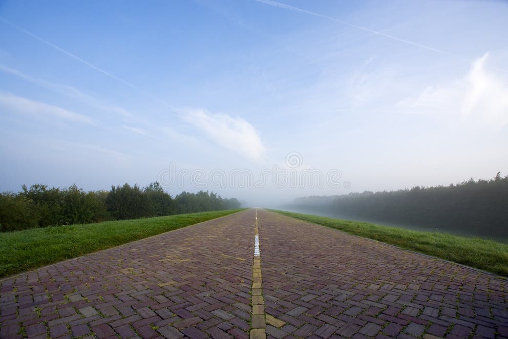 Straight brick road stock image. Image of blue, endless - 6560675
