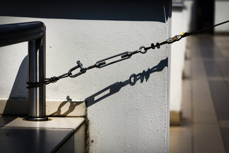 Straight Chain Holding Building Structure with Dark Shadow Stock Photo ...