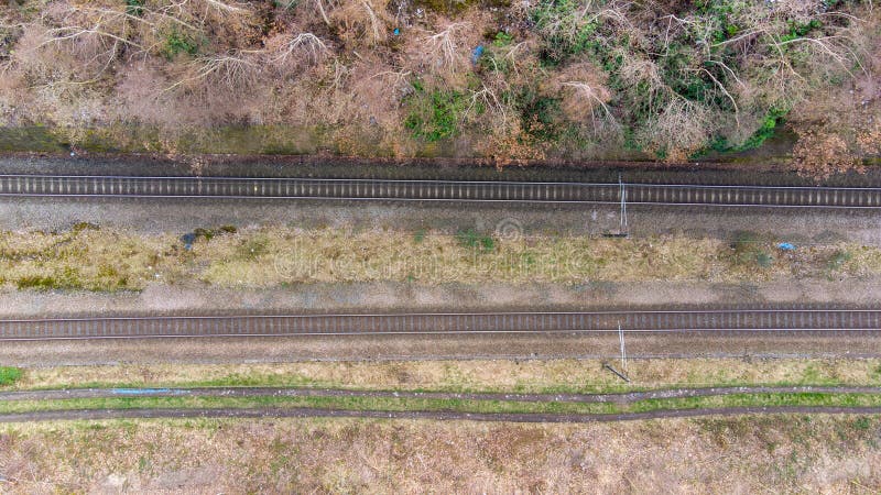 A Straight Down Aerial View of an Old Train Track in the Winter and ...