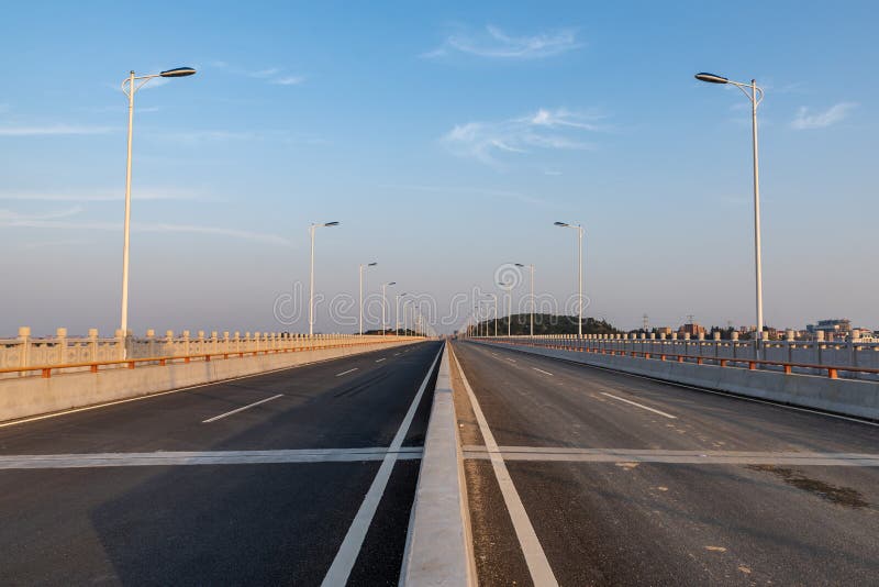A Straight Road Leading To the Distance on a Bridge Stock Photo - Image ...