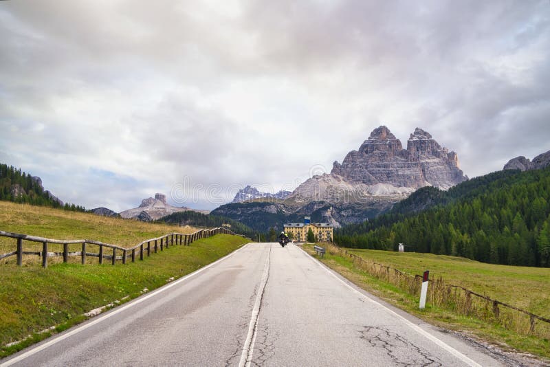 Straight Road To the Rocks on a Cloudy Day in Dolomites Stock Image ...