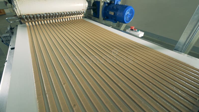 Top View of Straight Candy Lines Coming Out from Producing Machine ...
