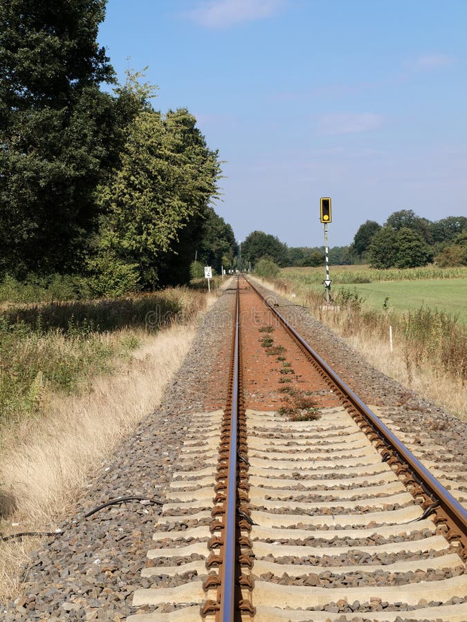 Straight Track, with Signal. Seemingly Endless. with Trees on the Side ...