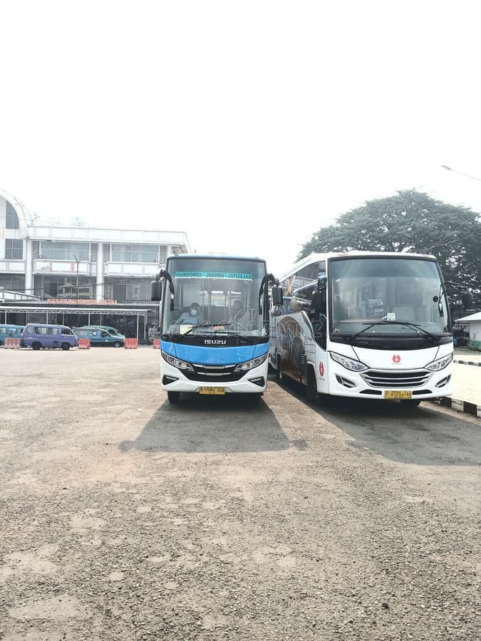 Straight View of Two Public Buses that Parking in Terminal Editorial ...