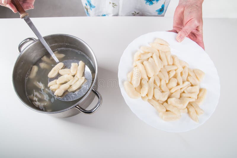 Straining Noodles from the Pot To the Plate Stock Image - Image of ...