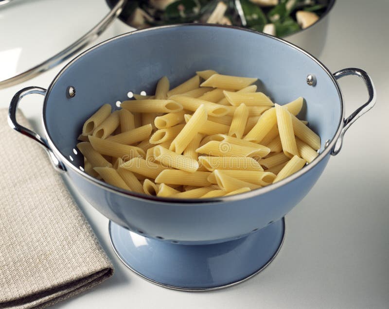 Straining the pasta stock image. Image of style, vegetable - 23705405