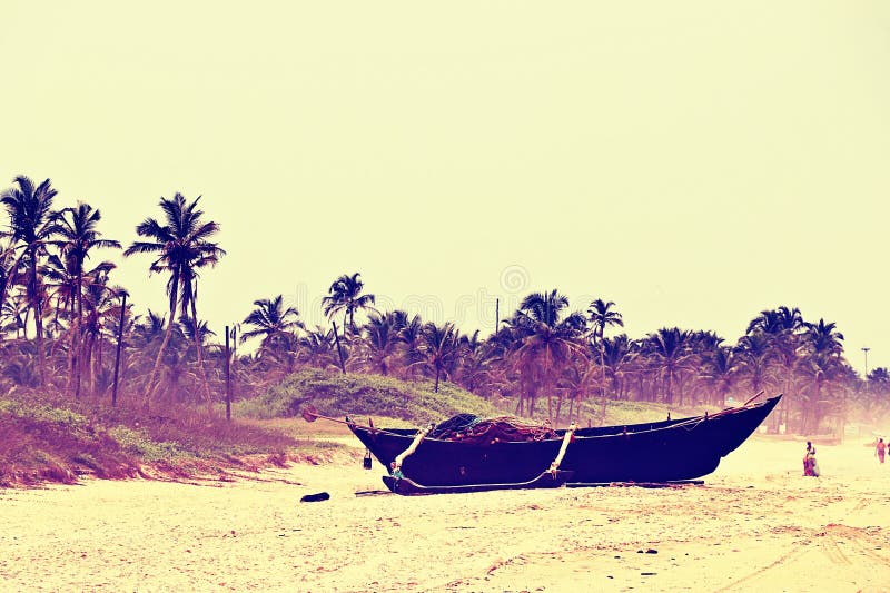 A Stranded Boat on a Beach in Goa in India Stock Photo - Image of boat ...