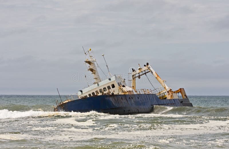 Stranded Ship stock image. Image of vessel, blue, scrap - 7897319