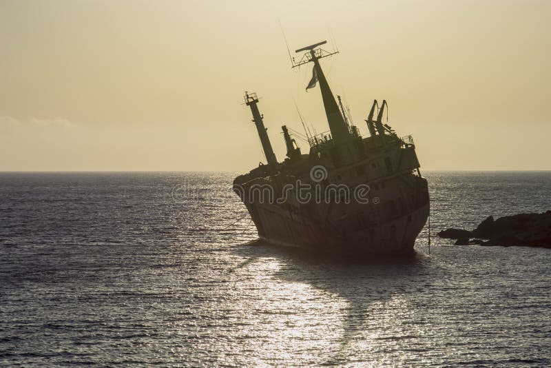 Stranded ship at sunset stock photo. Image of equipment - 147987550