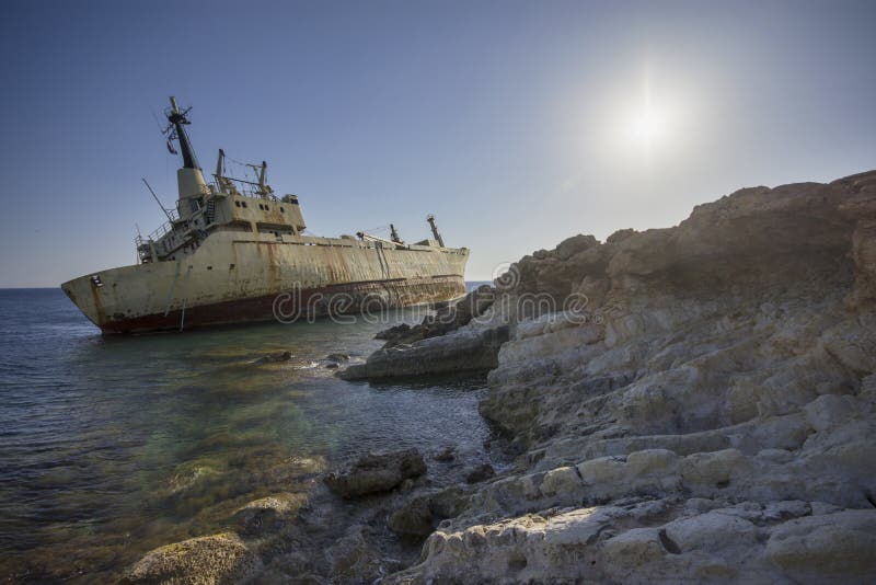 Stranded ship at sunset stock image. Image of solitude - 147987553