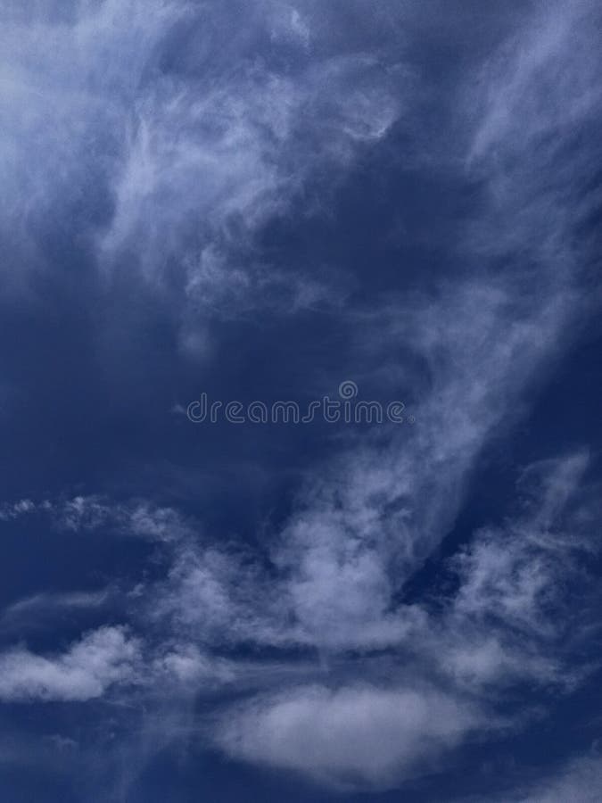 Strange Alien Head Shape Clouds Visible in the Sunny Daylight Stock ...