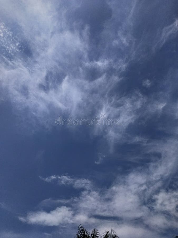 Strange Alien Head Shape Clouds Visible in the Sunny Daylight Stock ...