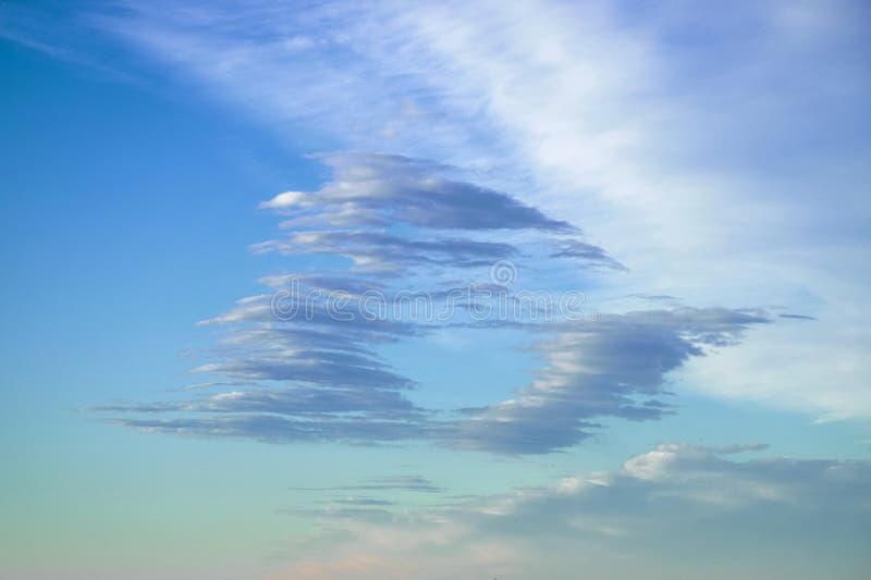 Strange Cloud Shaped Like a Ring. Blue Sky with Fluffy Clouds As a ...