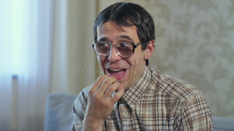 Strange Funny Nerd Watching TV Stock Footage - Video of television ...