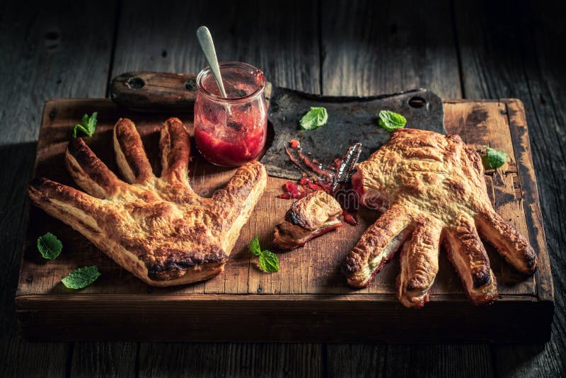 Strange Hand Cake with Strawberry Jam As Liking Concept Stock Photo ...