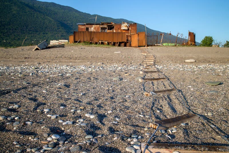 Strange Rusty Building on the Sand Stock Photo - Image of building ...