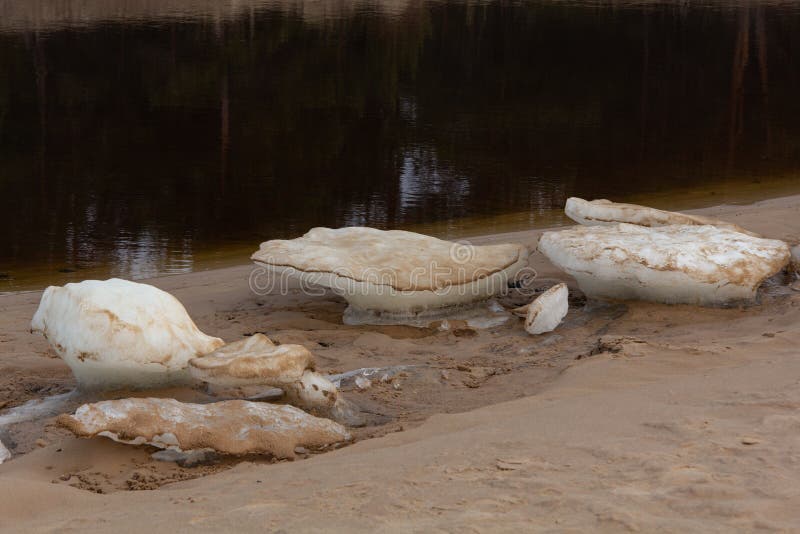 Strange Shaped Ice Cubes on the River Bank Stock Image - Image of ...