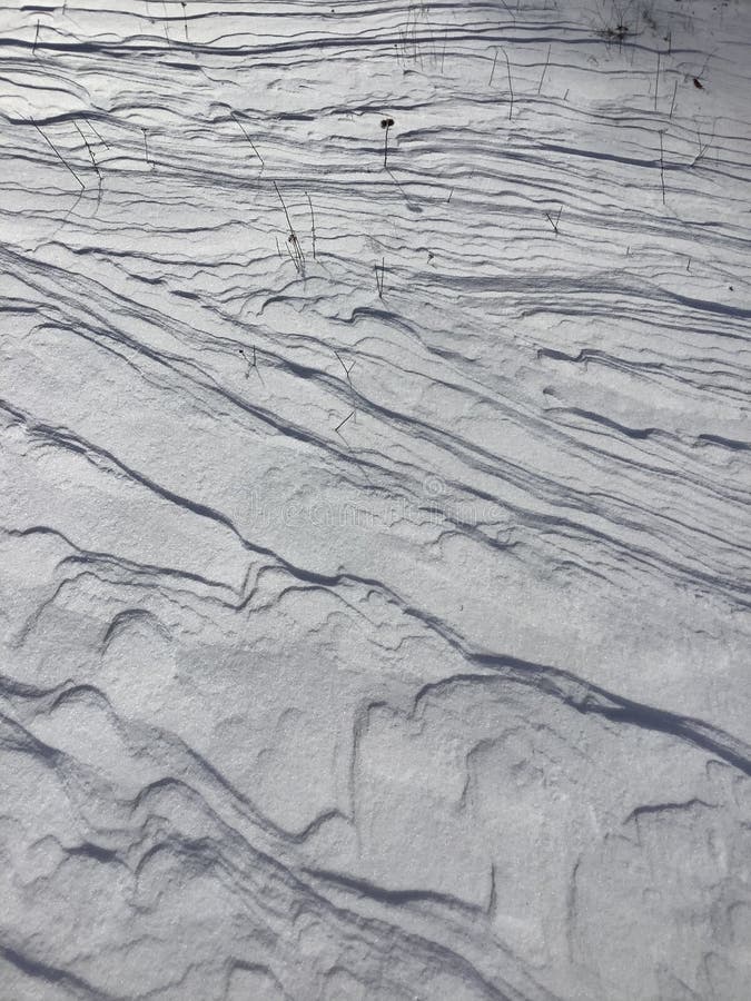 The Traces of a Blizzard on the Frozen Snow Stock Photo - Image of sand ...