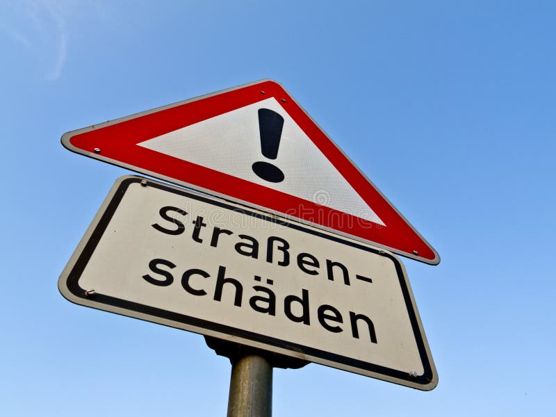 German Road Sign Warning Of Road Damage Stock Photo - Image of ...
