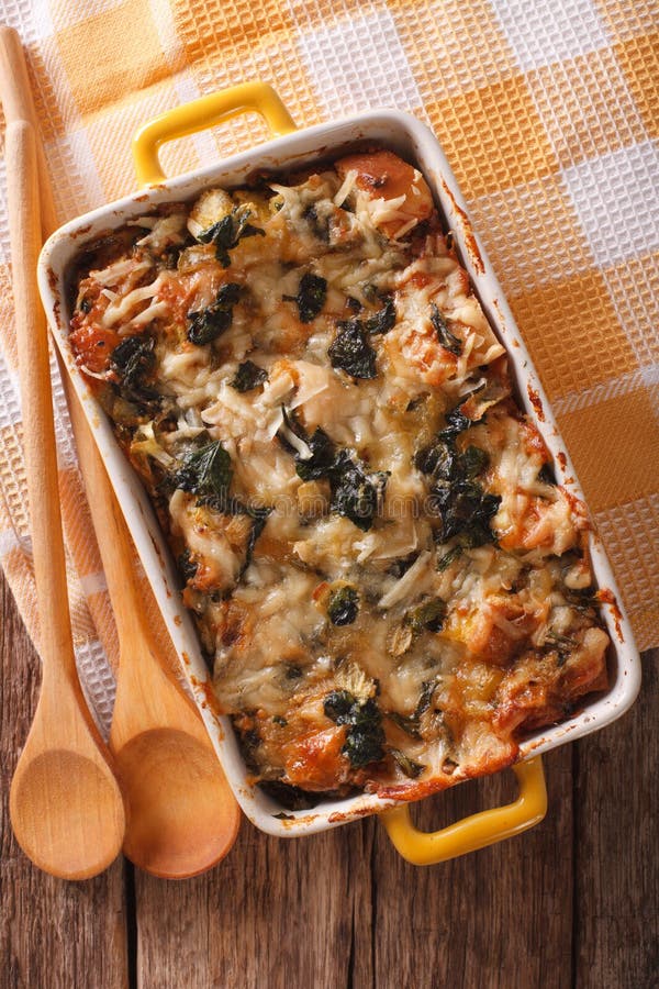Strata Casserole with Spinach, Cheese and Bread Close Up. Vertical Top ...
