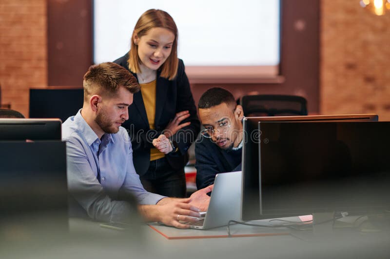 Strategic Business Meeting: Group of Professionals Collaborating in ...