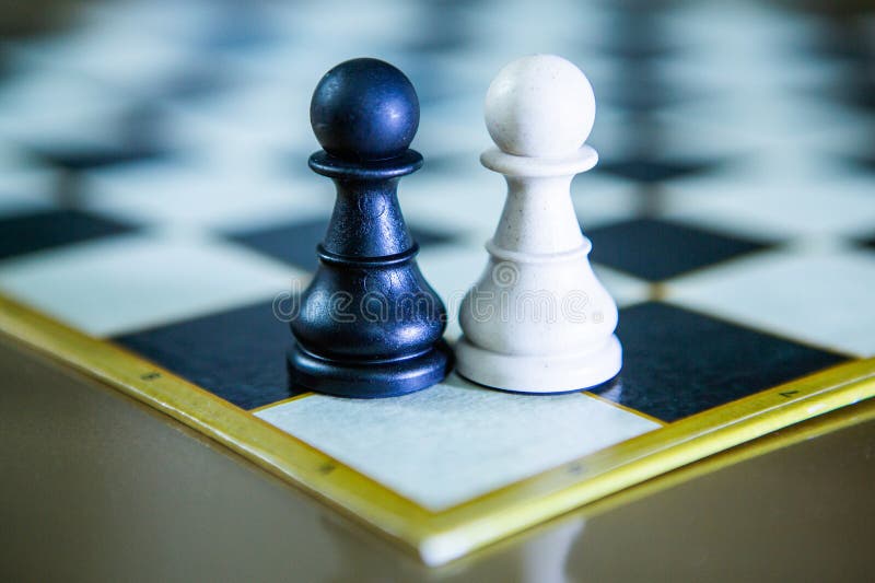 Strategic Chess Game in Progress on a Checkered Board Stock Photo ...
