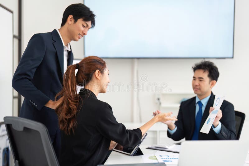 Strategic Discussion and Engagement. a Professional Team Analyzing Data ...