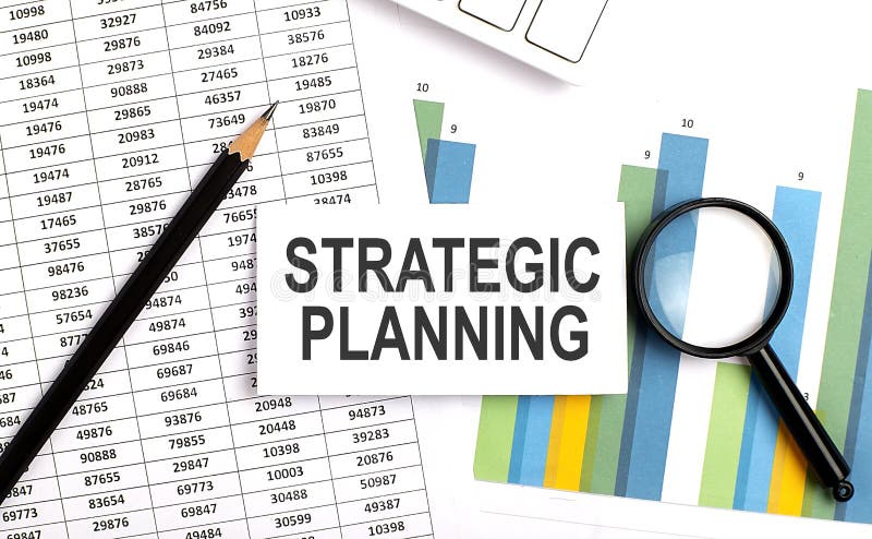 STRATEGIC PLANNING Text on White Card on the Chart Background Stock ...